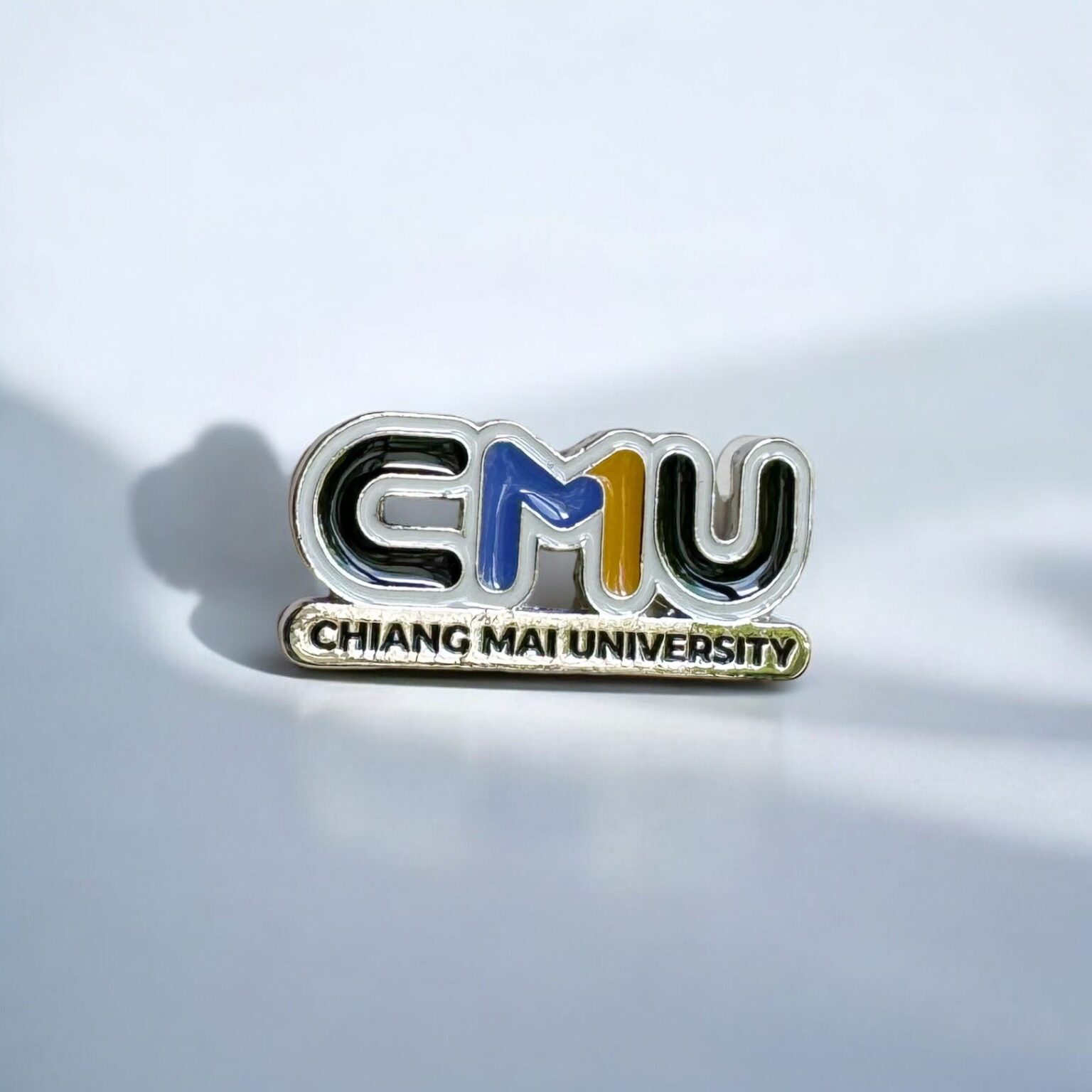 เข็มกลัด CMU – มูลนิธิพัฒนามหาวิทยาลัยเชียงใหม่ จำหน่ายของที่ระลึก